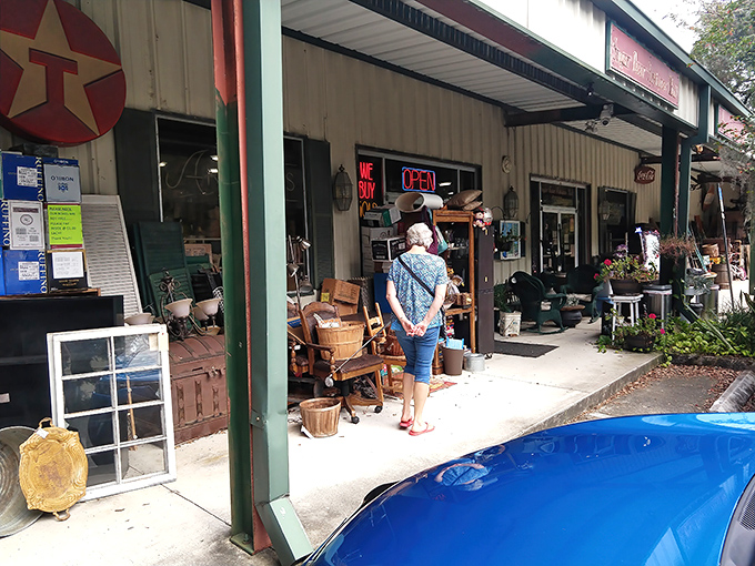 Every serious treasure hunter knows the stance: hands clasped behind back, leaning slightly forward. The universal posture of "I'm just browsing" before finding something irresistible.