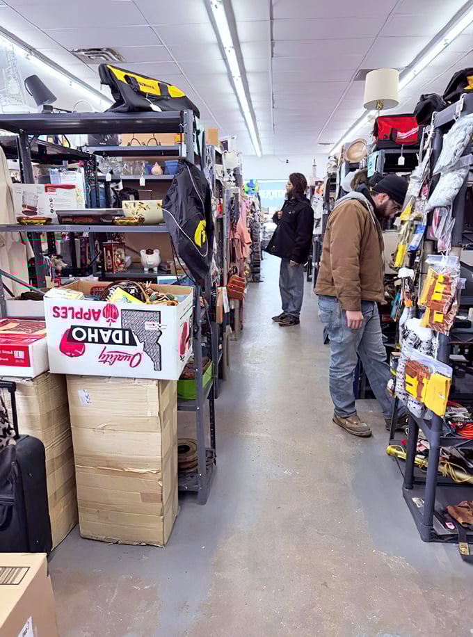 Treasure hunters navigate narrow aisles packed with possibilities. The serious expressions say it all&mdash;this isn't shopping, it's a mission.