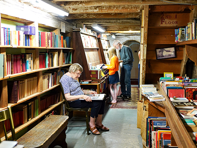 Between these wooden beams and crowded shelves, readers find their own private universe. The outside world can wait.