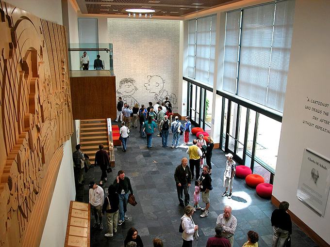 The Great Hall's soaring ceiling and natural light create a cathedral-like atmosphere&mdash;because for many of us, Peanuts was practically a religion growing up.