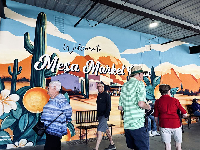 The vibrant welcome mural captures Arizona's essence—cacti, mountains, and sunshine—greeting shoppers like old friends returning from a long journey.
