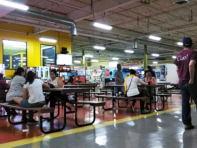 Shoppers navigate the endless aisles with the focused determination of seasoned treasure hunters on a mission. 