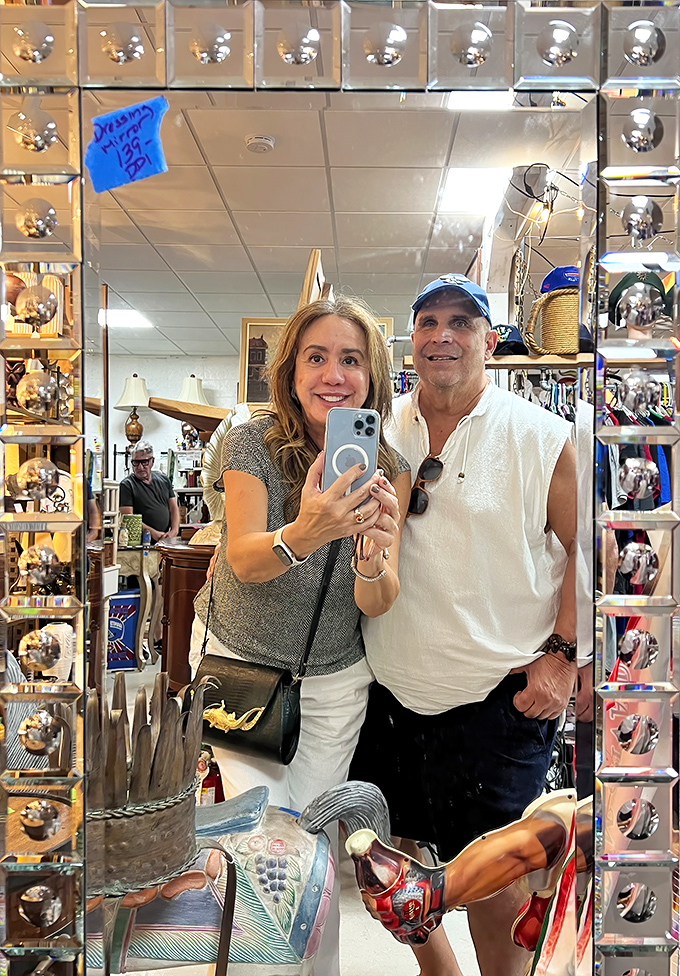 The ultimate mirror selfie spot! This vintage-framed looking glass has witnessed countless "Should I buy this?" moments and shopping victories.