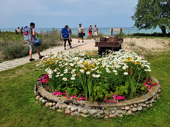 The carefully tended gardens add splashes of color to the grounds, creating a perfect pathway from the manicured lawns to Lake Huron's sandy shores.