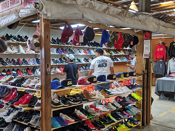 A rainbow of sneakers stacked with military precision. More footwear options than a centipede could wear in a lifetime.