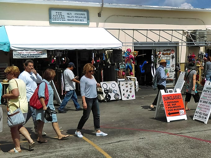 Weekend warriors navigate the market's pathways, following the siren song of sunglasses deals and unexpected discoveries. 