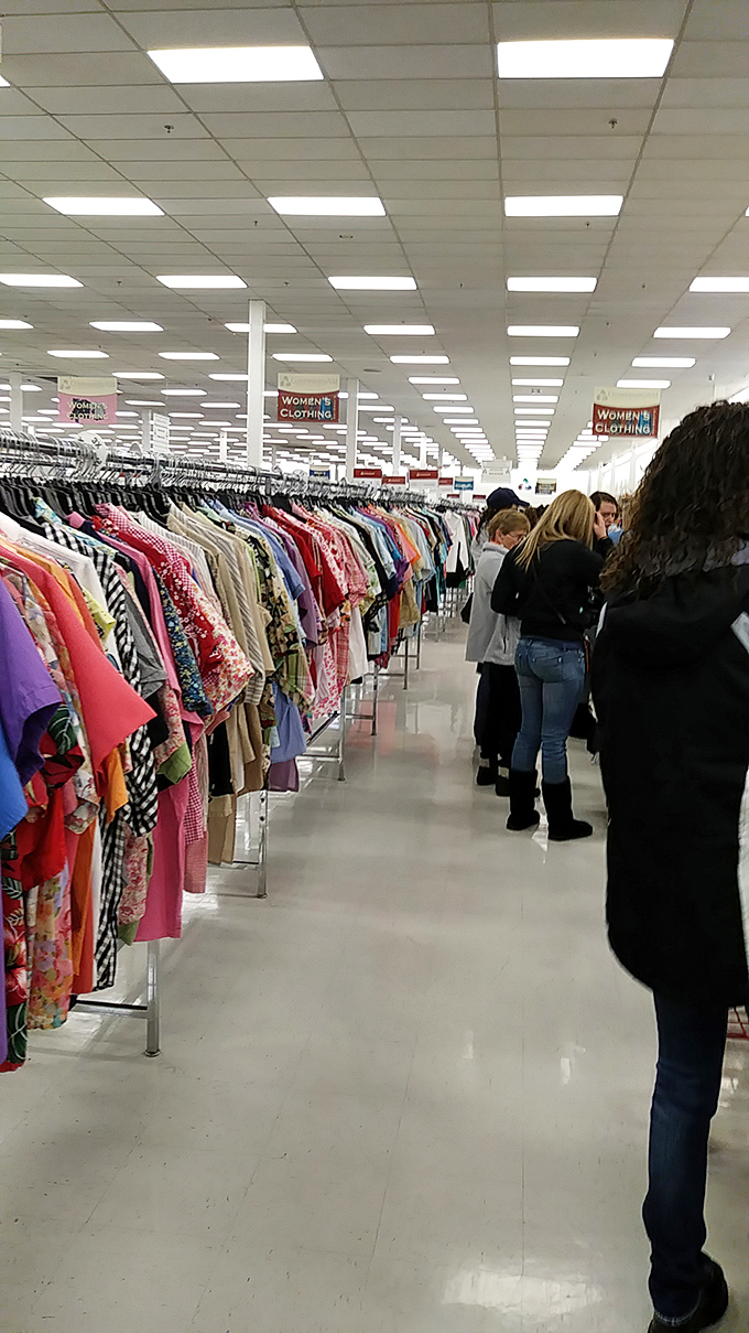 The thrill of the hunt in action&mdash;shoppers navigate the well-organized aisles like seasoned explorers on a quest for hidden gems.