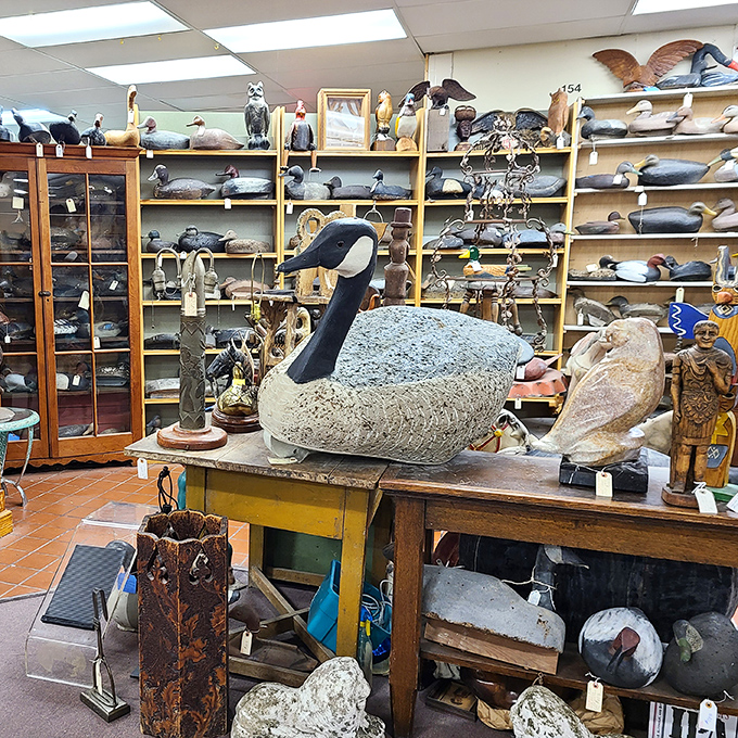 The waterfowl section&mdash;where decoys and carvings gather in silent formation, waiting for their next migration to someone's home.
