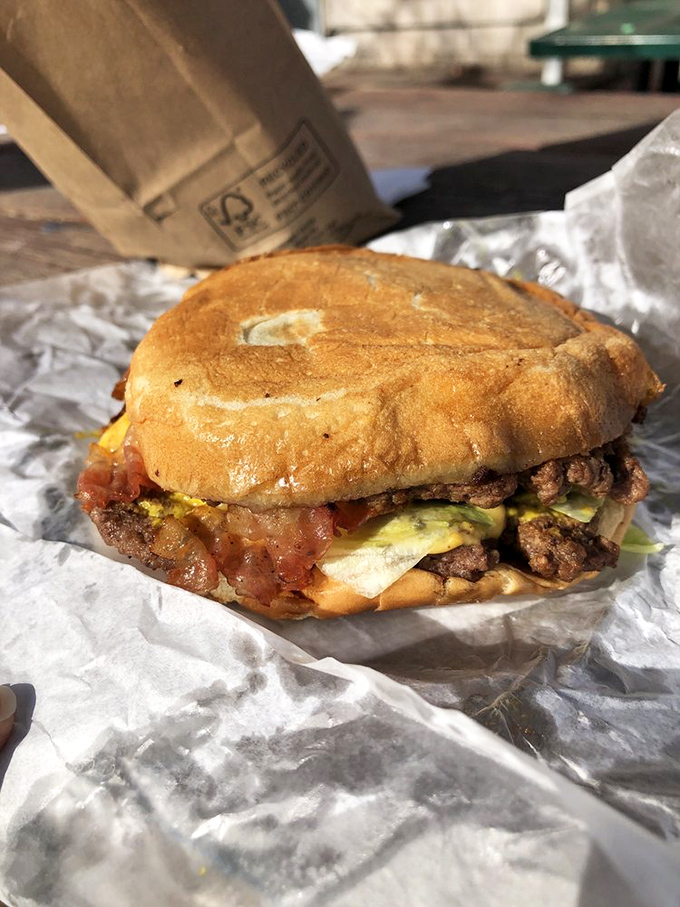 This isn't just a bacon cheeseburger; it's edible proof that simplicity, when executed perfectly, beats complexity every time.