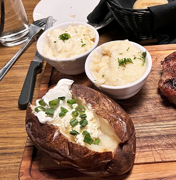 The humble baked potato, elevated to art form&mdash;crisp skin, fluffy interior, and all the fixings. Comfort food that refuses to be upstaged by its beefy companion.