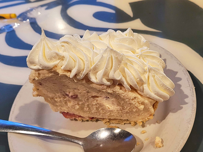 Cloud-like whipped cream crowns a slice of banana cream pie that would make your grandmother both proud and a little jealous.