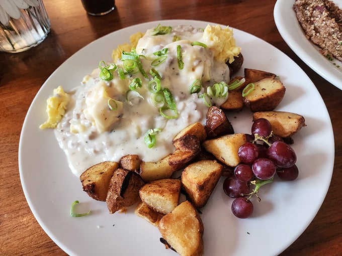 Biscuits and gravy that would make your grandmother simultaneously proud and jealous. Those potatoes and grapes aren't just garnish&mdash;they're supporting actors deserving awards.