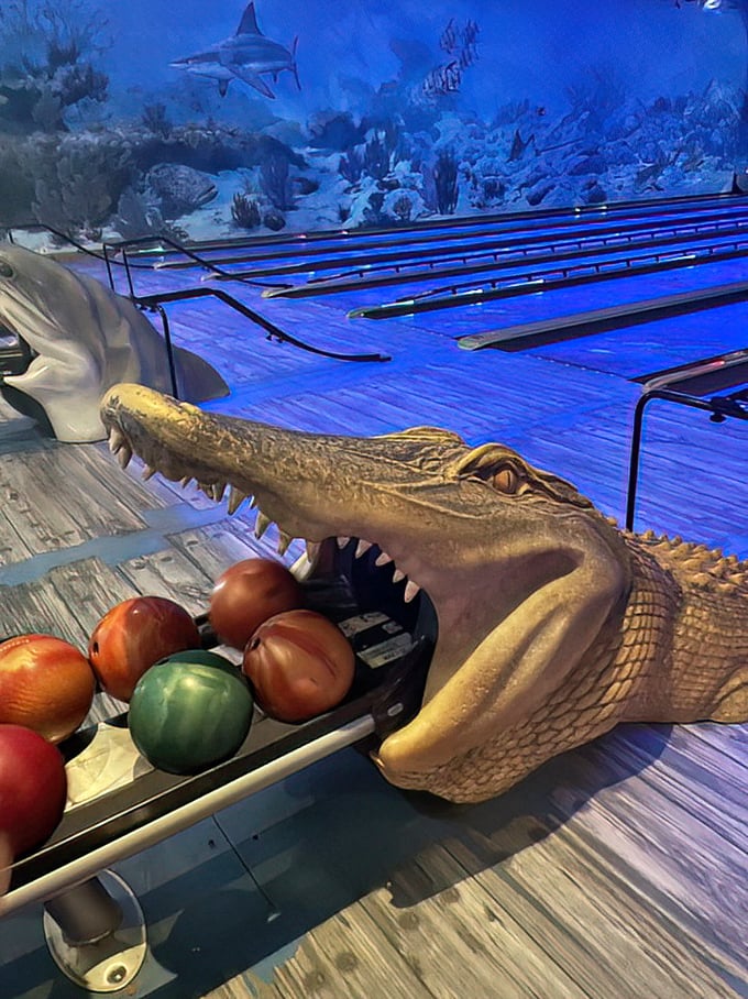 Even the ball returns are part of the theme&mdash;this gator's got quite an appetite for bowling balls rather than the usual tourist fare.