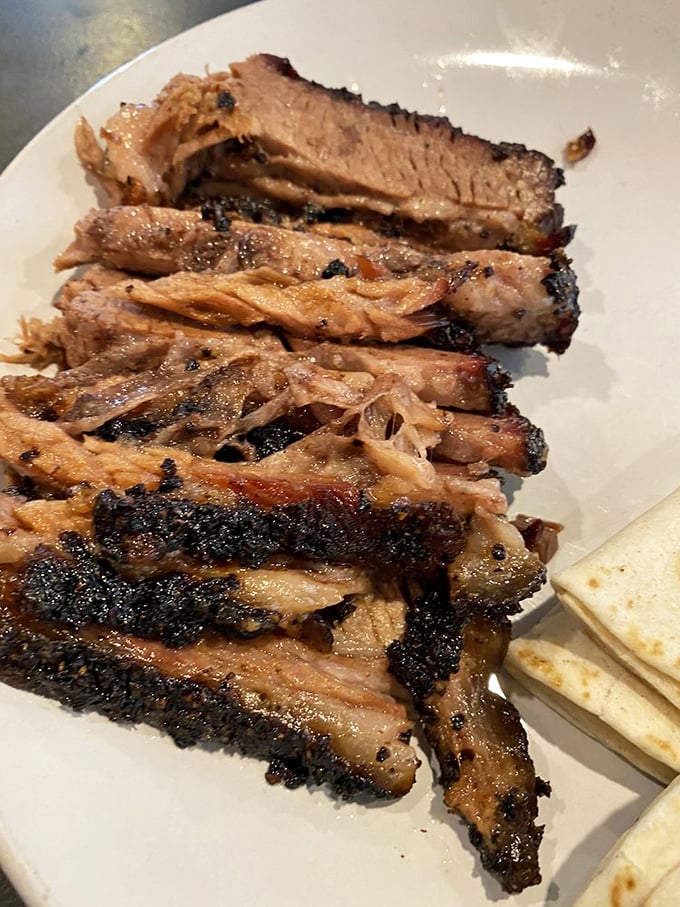 Brisket sliced to perfection reveals that coveted pink smoke ring &ndash; the barbecue equivalent of finding the Hope Diamond in your backyard.