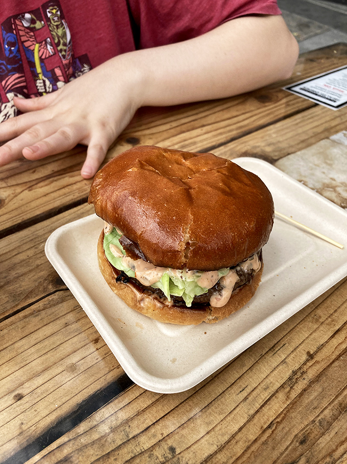 This isn't just a burger; it's an edible work of art on a brioche canvas, with special sauce adding that perfect tangy finish.