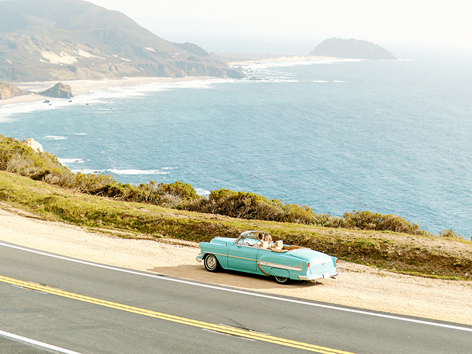 Nothing says "California dreaming" quite like a vintage convertible on Highway 1. This teal beauty is living its best automotive life.