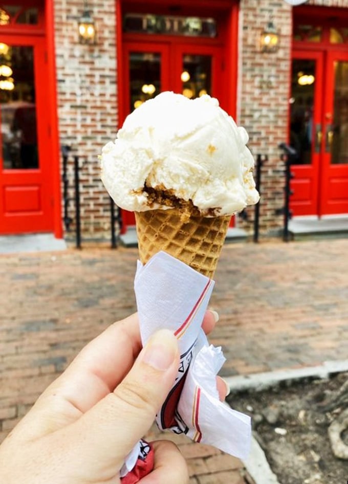 A scoop of vanilla perched proudly on a freshly-made waffle cone&mdash;proof that sometimes the simplest pleasures make the most profound memories.