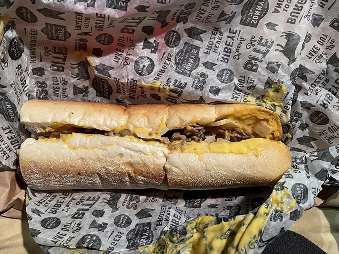 The classic cheesesteak in its natural habitat&mdash;gloriously messy, unapologetically simple, and worth every napkin you'll need afterward.