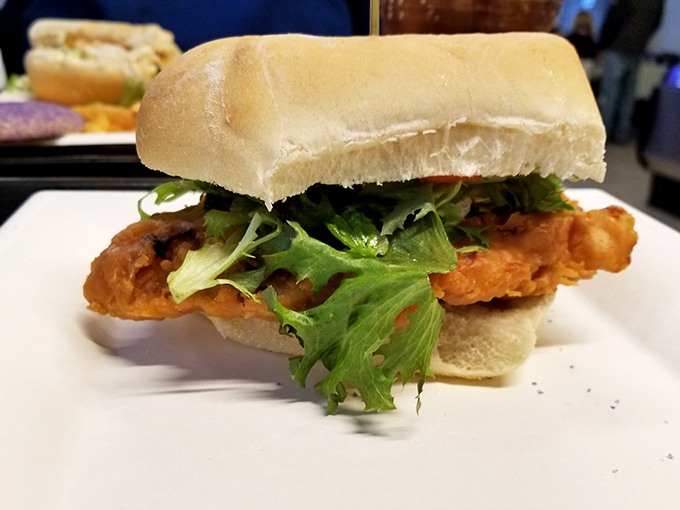 Not just any chicken sandwich&mdash;this creation elevates lunch to art form status with crispy coating, fresh greens, and bread that knows its supporting role.