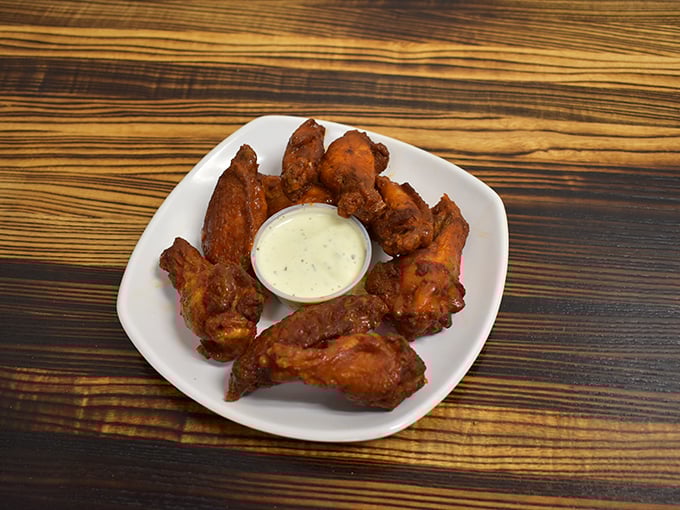 These wings aren't playing second fiddle to anyone, not even the famous pizza. Crispy, saucy, and demanding your full attention.