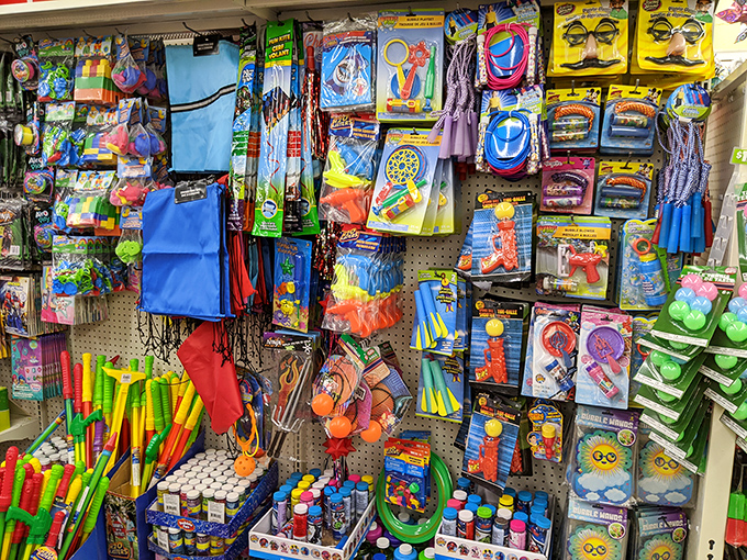 A kaleidoscope of childhood joy hanging from every hook. These toys prove imagination doesn't need a premium price tag to take flight.