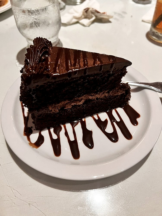Chocolate cake that doesn't need deconstructing or reimagining &ndash; just three layers of unapologetic decadence that would make your cardiologist wince and your soul sing.
