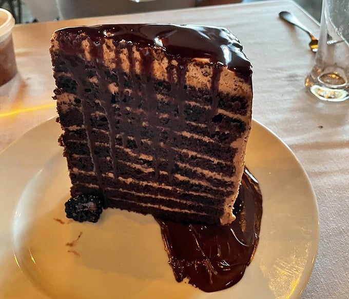 This towering chocolate cake could end wars and start new friendships with every decadent forkful.