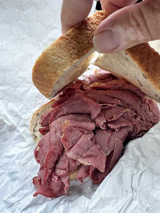 Not so much a sandwich as a skyscraper of corned beef. The meat-to-bread ratio here would make any New Yorker nod in solemn approval.