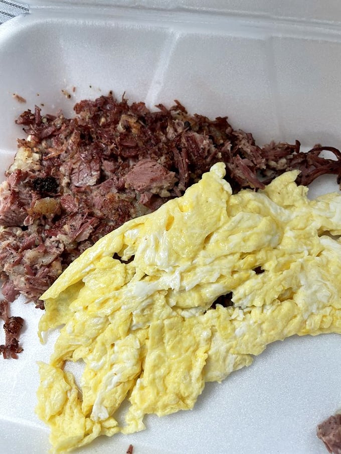 Corned beef hash and eggs &ndash; the breakfast of champions who plan on napping by noon. This plate doesn't just speak to you, it sings.