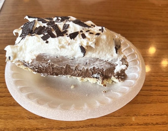 This chocolate cream pie doesn't just end a meal&mdash;it's the grand finale that makes you forget every diet promise you've ever made.