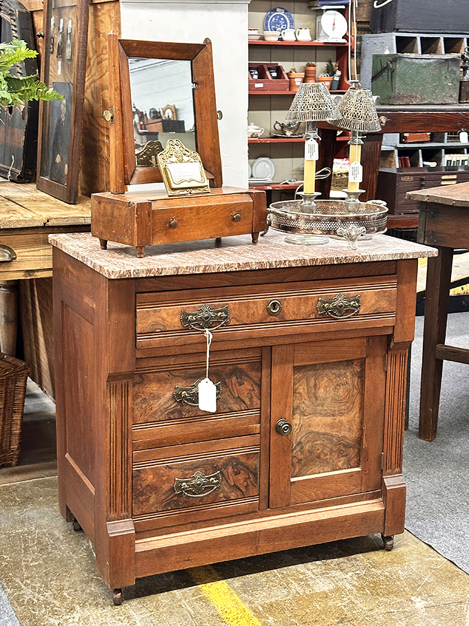 This isn't just furniture; it's functional art with stories etched into every drawer pull. Marble-topped craftsmanship that puts today's flat-pack wonders to shame.