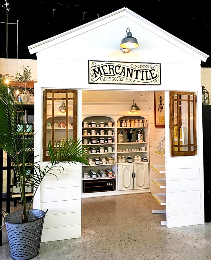 The "Mercantile" section transports you straight to a general store from yesteryear. White shiplap, vintage containers, and old-fashioned charm create an irresistible shopping experience.