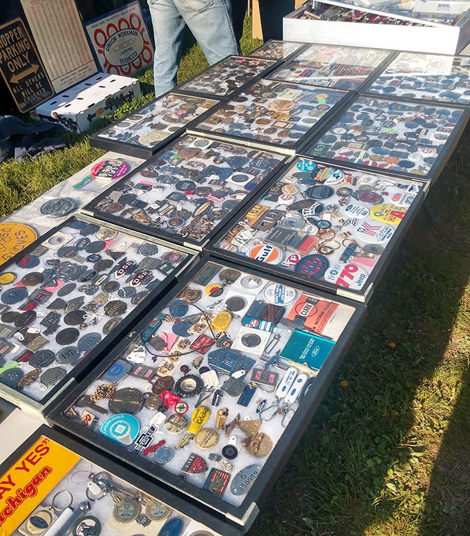 Memory buttons and vintage badges tell stories of places long gone. Each tiny metal disc represents someone's concert, campaign, or cherished cause. 