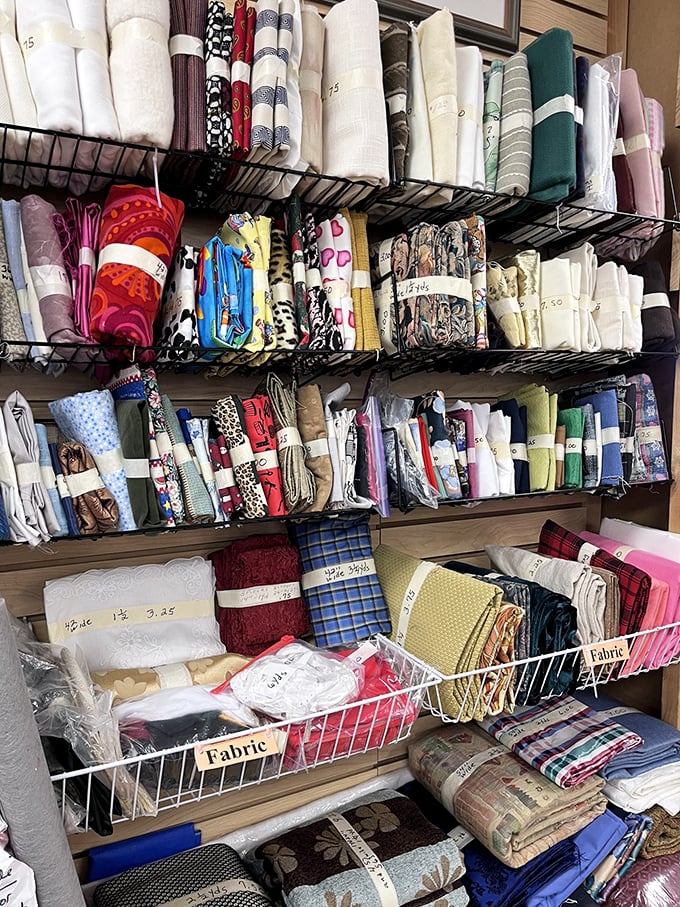 A fabric lover's dream! These neatly organized textiles await their transformation into quilts, crafts, or that window treatment you've been postponing.