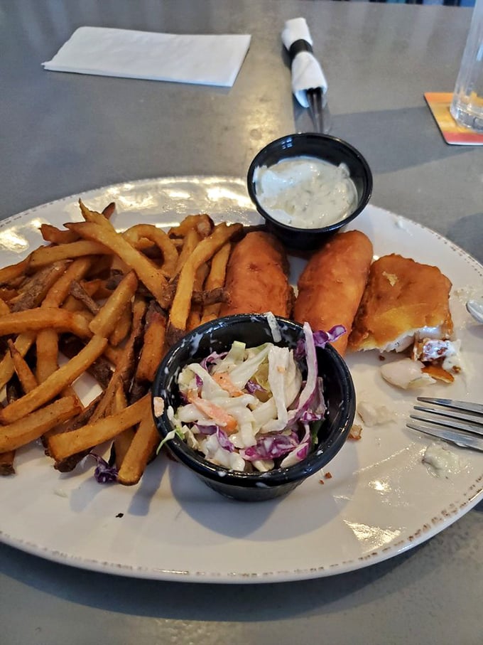 The fish and chips come with a side of coleslaw that isn't an afterthought—it's part of the holy trinity of comfort.