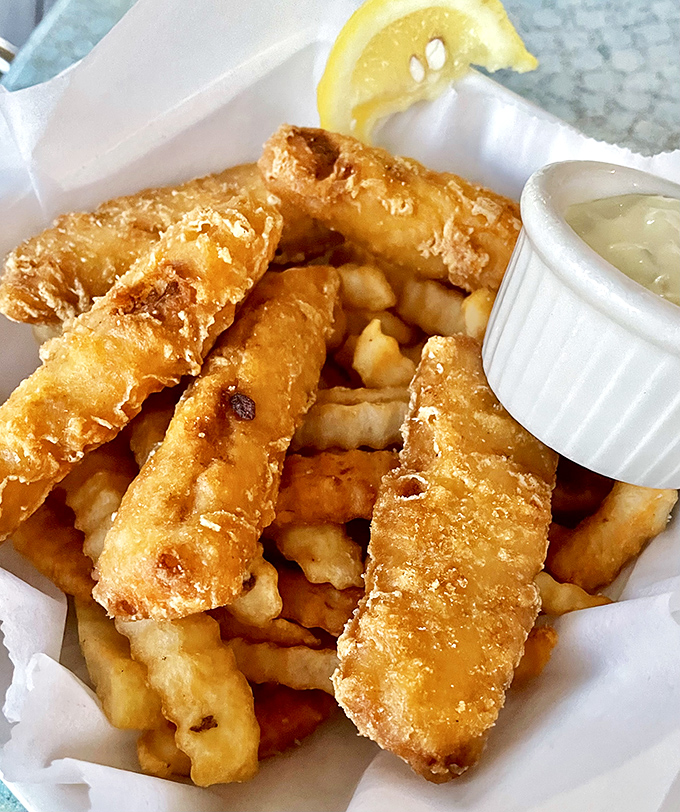 These aren't just fish and chips&mdash;they're crispy ambassadors from the sea, demanding to be dipped.