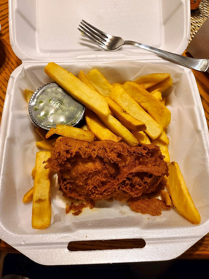 Even the takeaway presentation respects tradition. This isn't fast food; it's British comfort packaged with the same care the Queen takes selecting her hats.