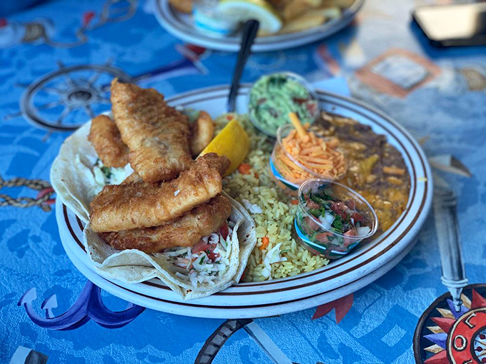 These aren't just fish tacos&mdash;they're a coastal California symphony on a plate, complete with rice pilaf playing backup.