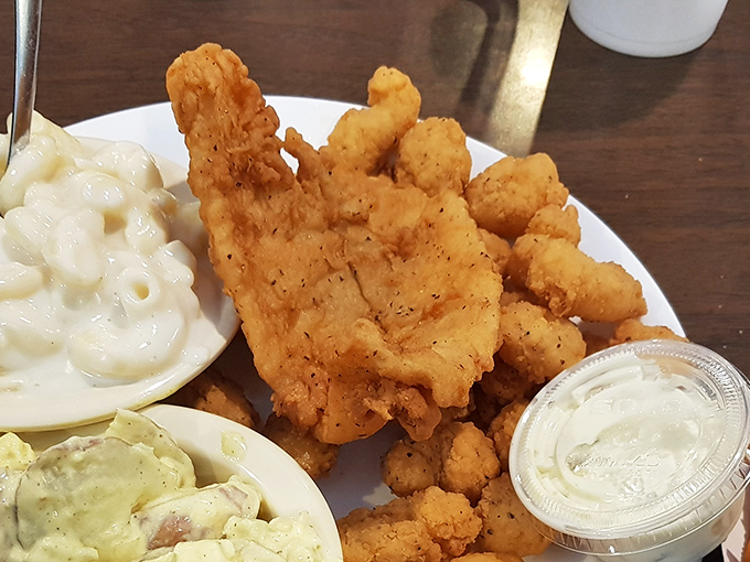 Golden-fried flounder and creamy sides&mdash;proof that Countryside's talents extend well beyond the smoker. The South's culinary versatility on display.