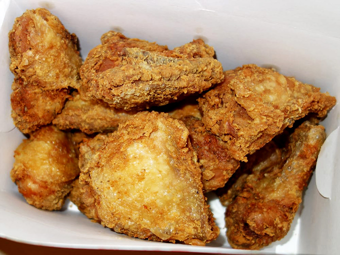 This isn't just fried chicken; it's edible artwork with a PhD in crispiness and a master's degree in juiciness.