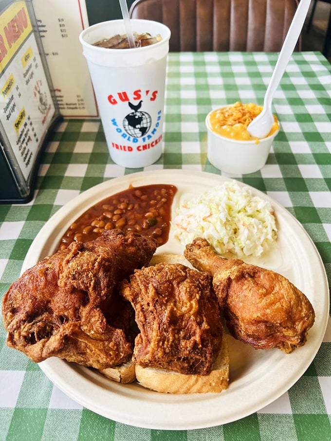 The holy trinity of Southern comfort: spicy fried chicken, creamy coleslaw, and savory baked beans. Add mac and cheese because, well, why wouldn't you?