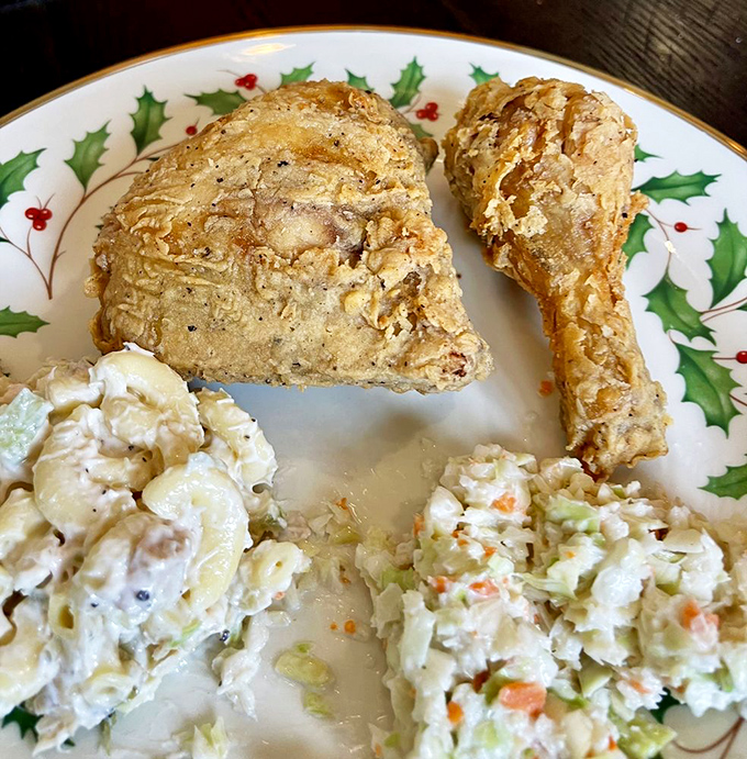 Holiday plate or everyday indulgence? Crispy fried chicken paired with homestyle sides on festive dinnerware makes any meal feel like a special occasion.