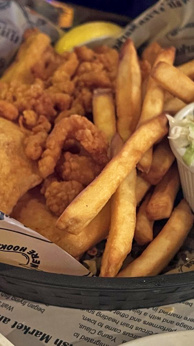 Fried seafood perfection in a basket &ndash; where crispy meets tender in that magical zone that makes you forget counting calories was ever invented.
