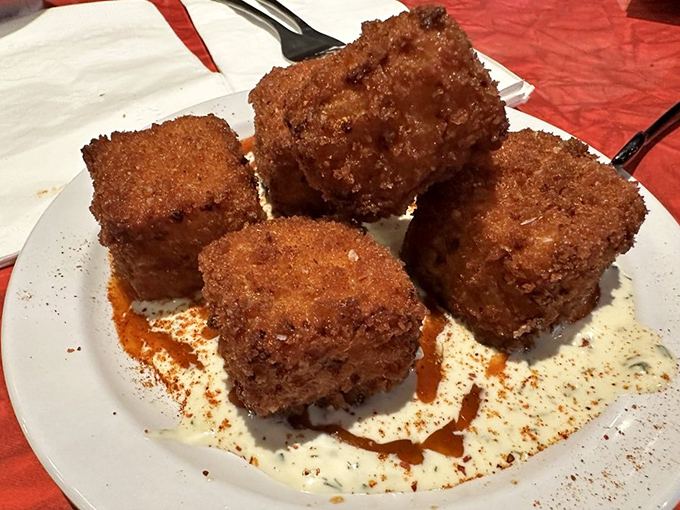 These aren't just fried mac and cheese squares&mdash;they're what would happen if comfort food went to finishing school and came back with a PhD in deliciousness.