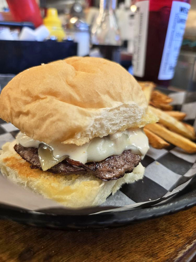 The perfect cheeseburger doesn't exi&mdash; Oh wait, there it is! Melted cheese cascading down a hand-formed patty with golden fries standing guard.