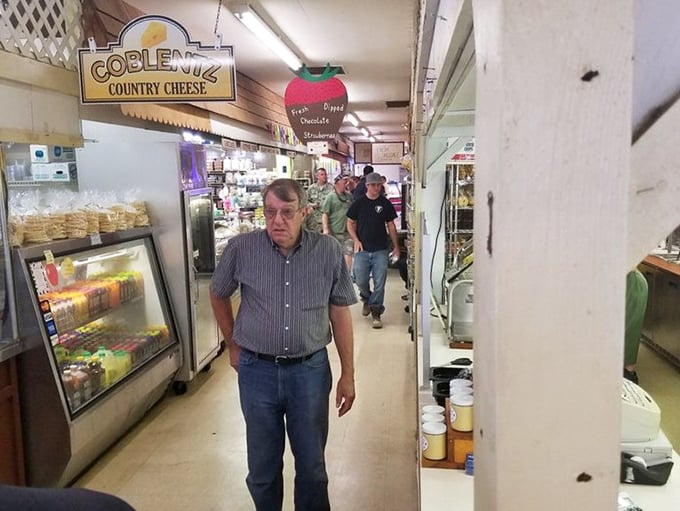 The Coblemus Country Cheese sign beckons dairy devotees through a corridor that feels like stepping into your grandparents' pantry&mdash;if they collected everything delicious.