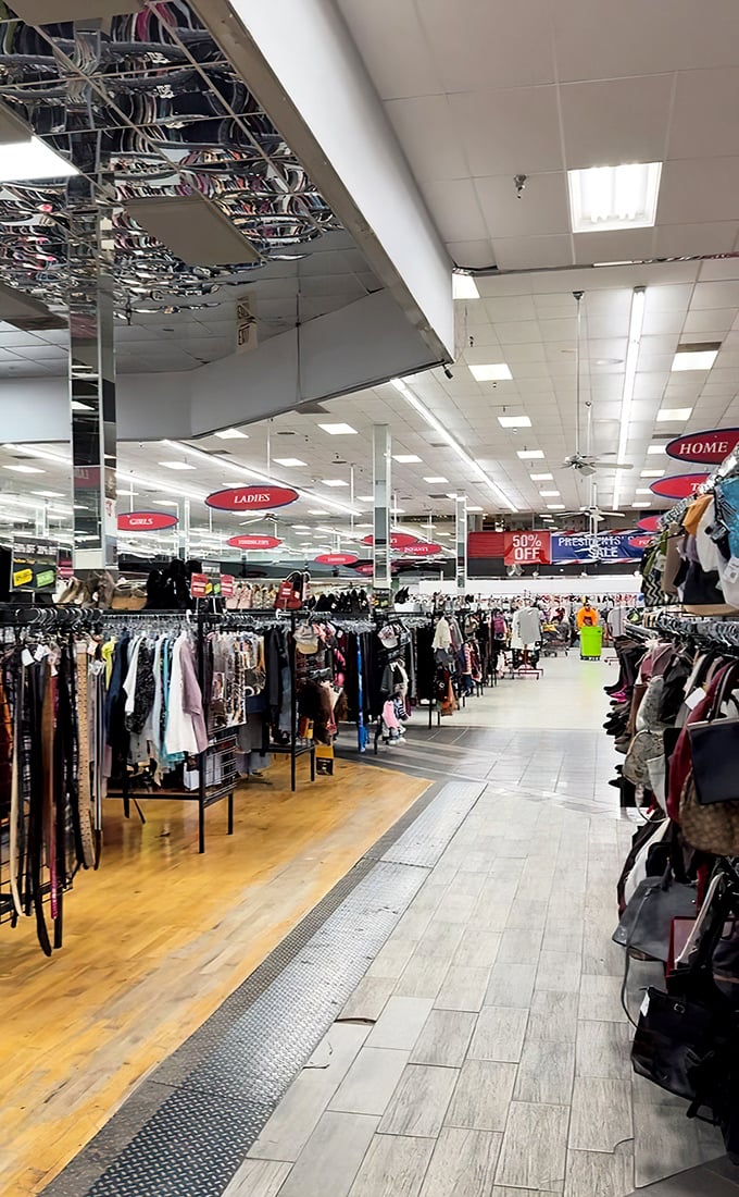 Red oval signs hover like retail UFOs, guiding shoppers through a sea of second-hand possibilities.