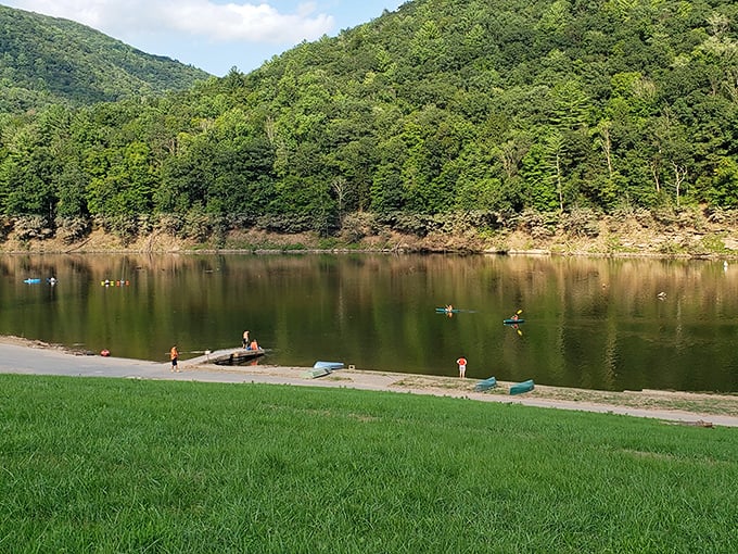 Summer's perfect equation: crystal water + kayaks + mountain backdrop = memories that outlast your smartphone battery.
