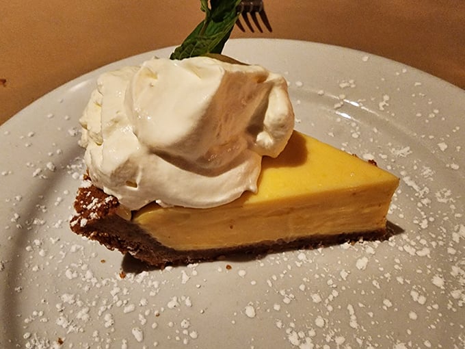 The key lime pie arrives like a ray of sunshine&mdash;bright, tangy, and topped with a cloud of whipped cream that defies gravity.