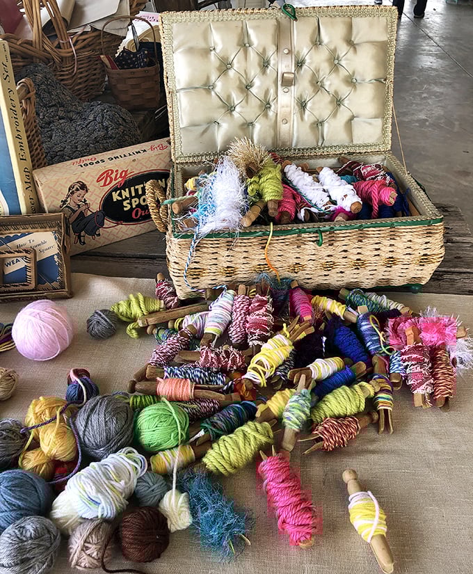 A crafter's dream caught in mid-explosion. These colorful yarn spools aren't just supplies&mdash;they're future heirlooms waiting to be created.